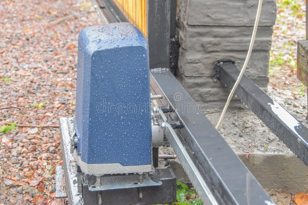 A Automatic Gate Mechanism on the Garden Plot Stock Photo - Image of ...