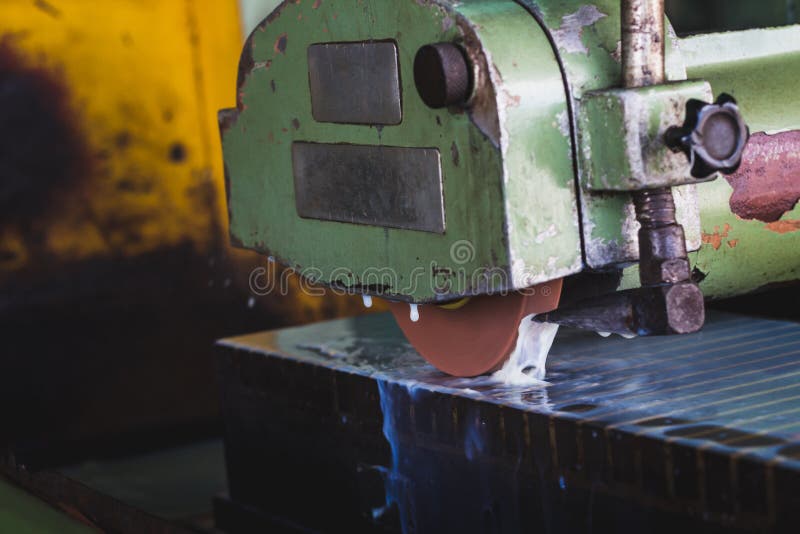 Automatic Grinder Machine Active with Cooling Water Stock Image - Image ...