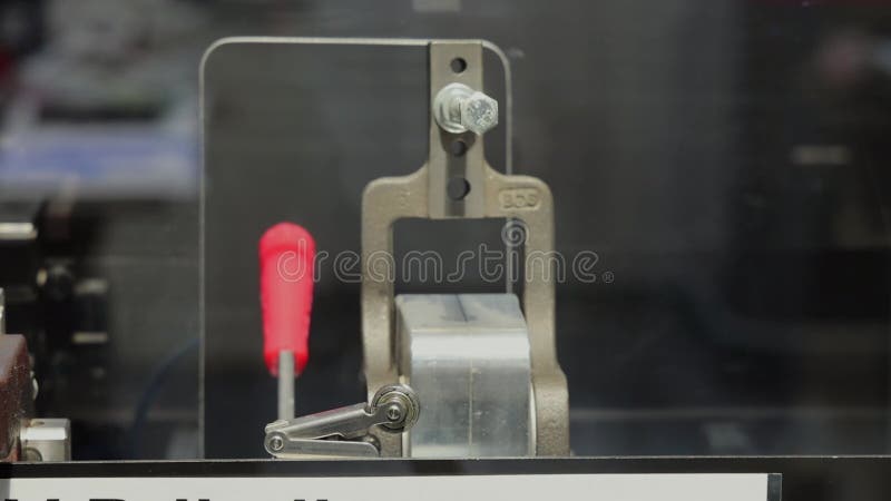 Automated Hold Metal Clamp stock footage. Video of toggle - 388474502