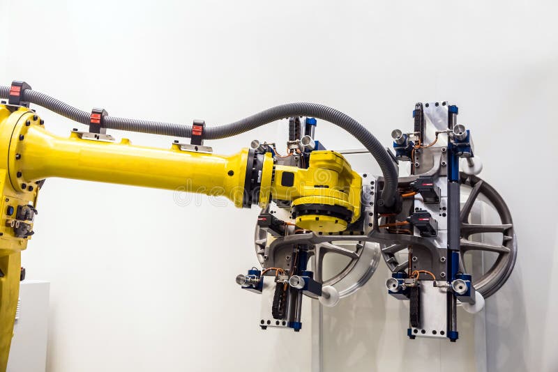 An Automatic Industrial Machine in Action, Packaging Products and Food ...