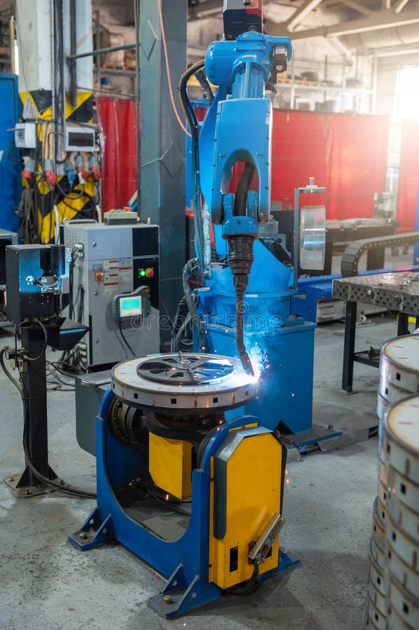 Automatic Industrial Welding Robot in a Modern Factory Stock Photo ...