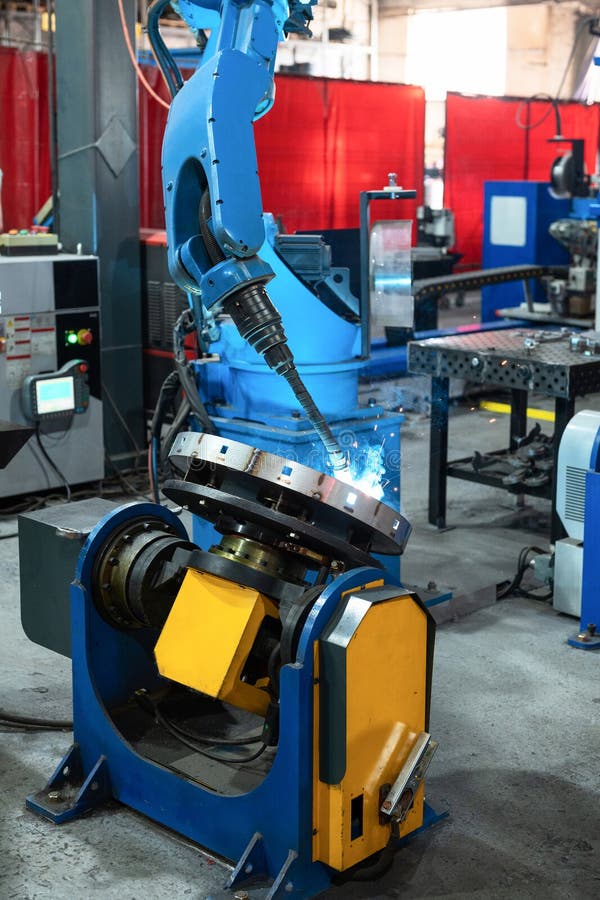 Automatic Industrial Welding Robot in a Modern Factory Stock Photo ...