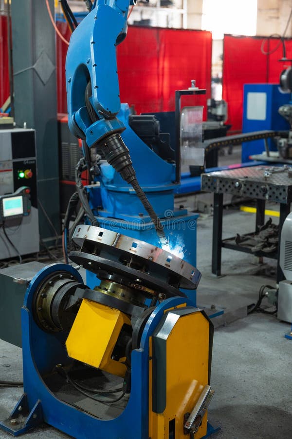 An Automatic Industrial Machine in Action, Packaging Products and Food ...