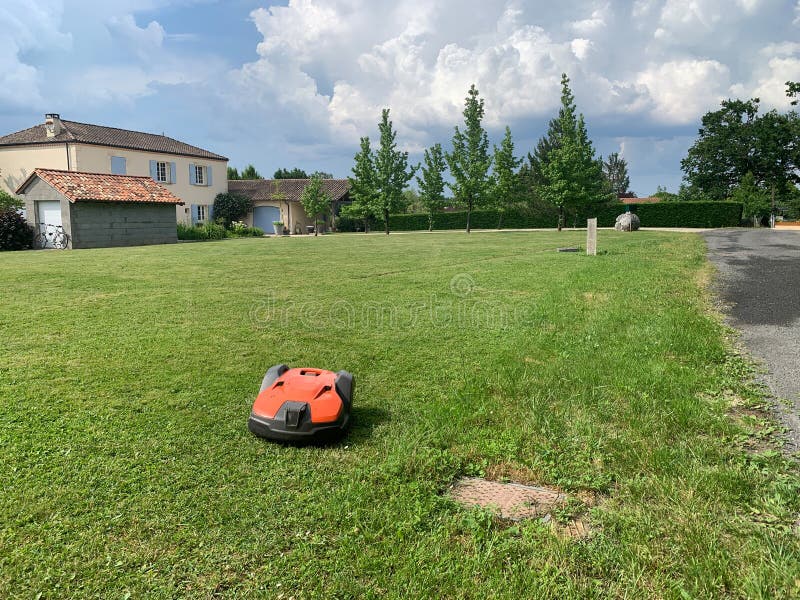 Automatic Lawn Mower at Work. Stock Image - Image of electric, meadow ...