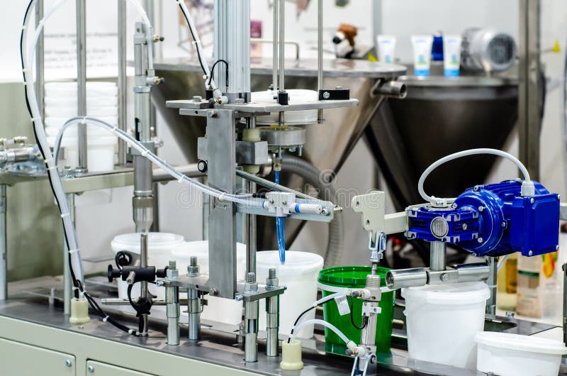 Automatic Line for Packing Seafood. Stacking Seaweed and Pouring Brine ...