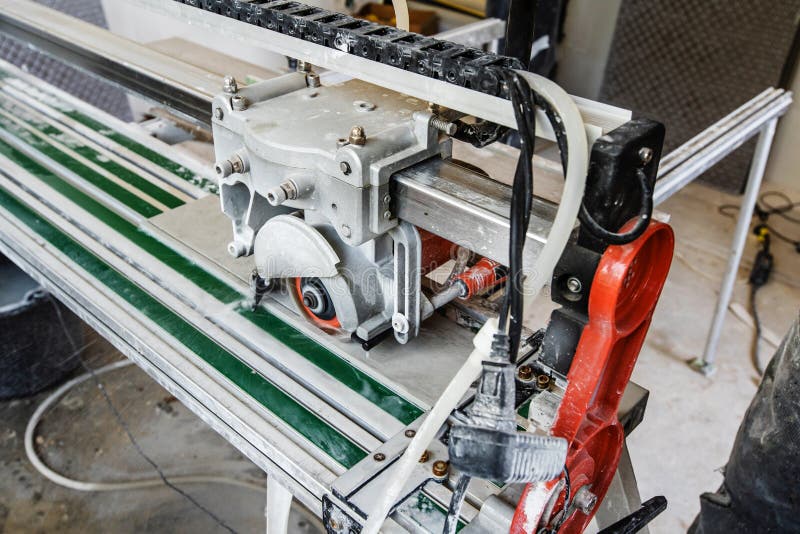 Automatic Machine for Cutting Ceramic Tiles. the Process of Operation ...