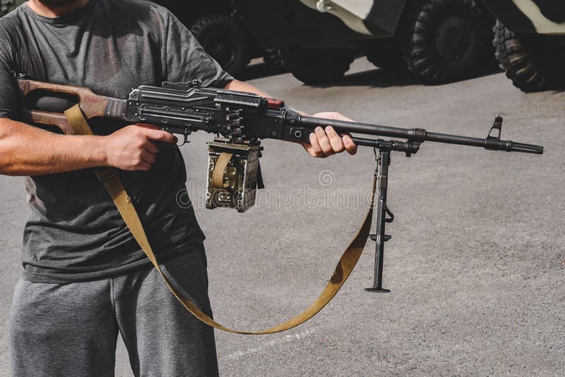 Automatic Machine Gun in the Hands of a Military Man Stock Photo ...
