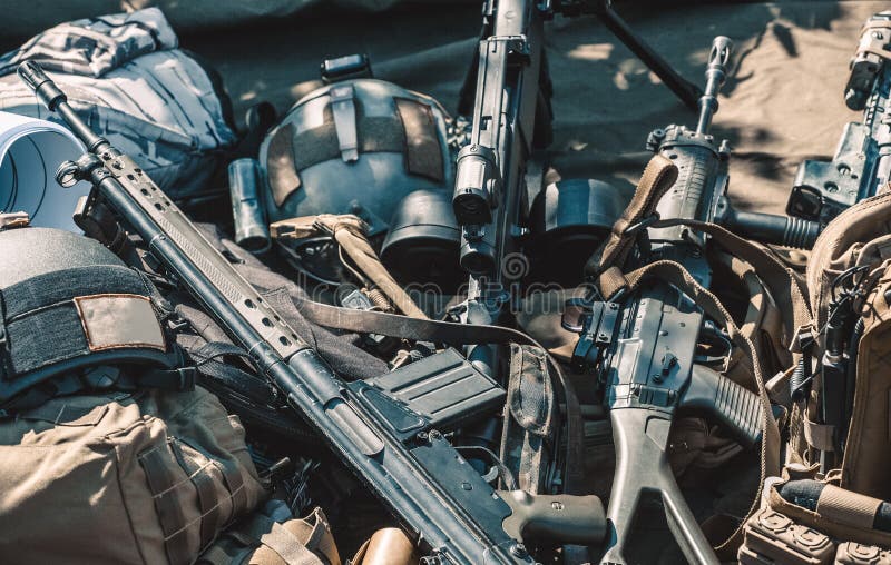Automatic Machine, Machine Gun, Helmet, Body Armor Piled in a Heap ...