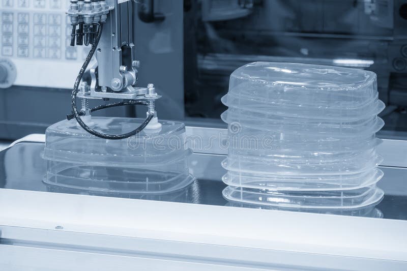 Automatic Material Handling Process on the Injection Mold Machine in the Blue Tone Scene Stock ...