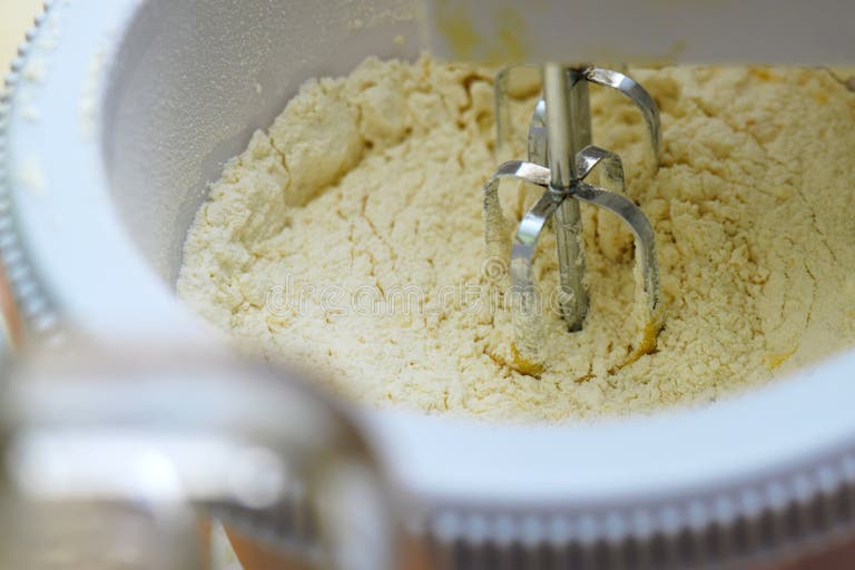 Automatic Mixer Blending Flour with Milk and Eggs To Create a Smooth ...