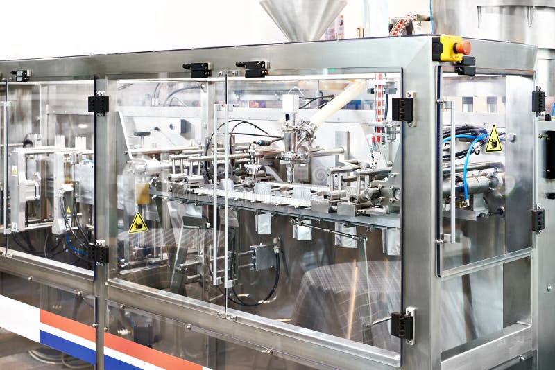 Automatic packaging line stock image. Image of plastic - 217174453