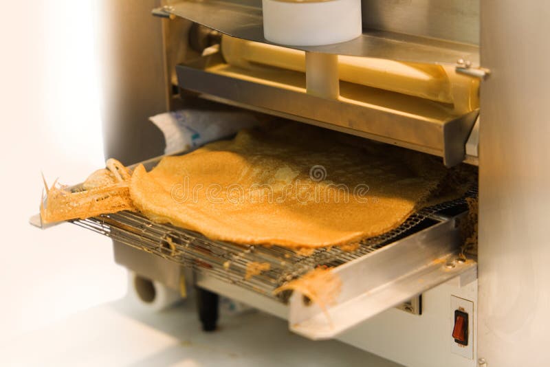 Automatic pancake machine stock image. Image of automated - 10116965