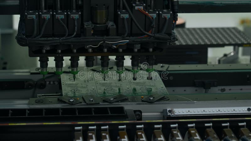 Automatic Pick and Lace Machine is Installing Components on Circuit ...