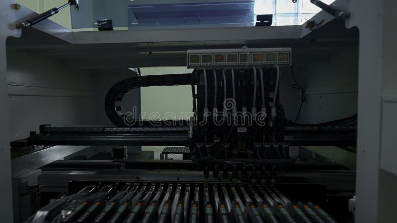 Automatic Pick and Place Machine is Installing Components on Circuit ...