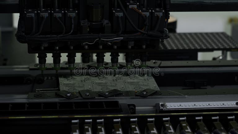 Automatic Pick and Place Machine is Installing Components on Circuit ...