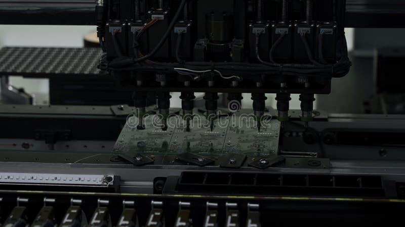 Automatic Pick and Place Machine is Installing Components on Circuit ...