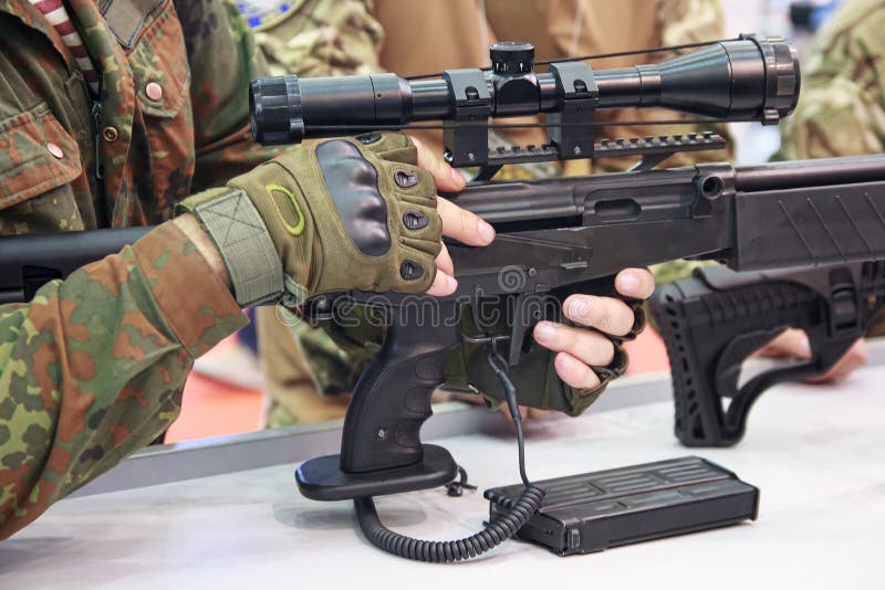 Automatic Rifle and a Man in Camouflage Uniform Stock Photo - Image of ...