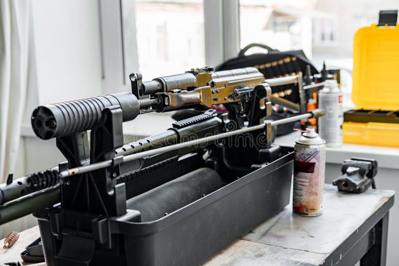 Automatic Rifle on Stand on the Table of the Weapons Workshop. Stock ...