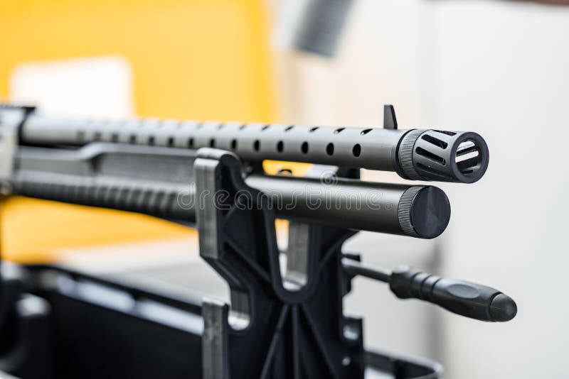 Automatic Rifle on Stand on the Table of the Weapons Workshop Stock ...