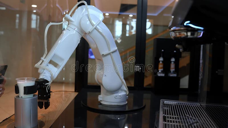 Automatic Robot Arm Preparing Coffee with Coffee Machine. Stock Footage ...