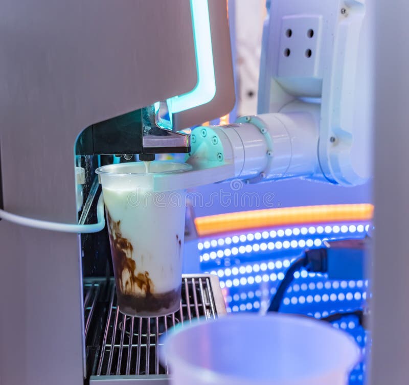 Automatic Robot Arm Preparing Coffee with Coffee Machine Stock Image ...