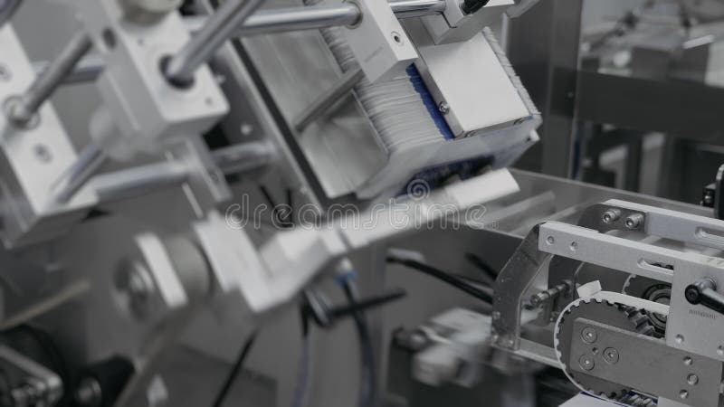 Automatic Robot Packer Feeds Cardboard Boxes for Medicine Packaging ...