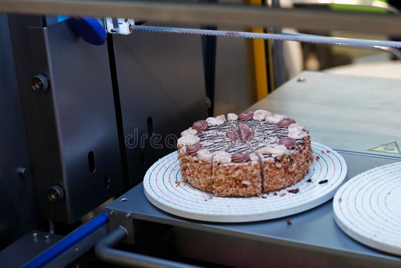 Automatic Round Cake Cutting Machine Stock Photo - Image of delicious ...
