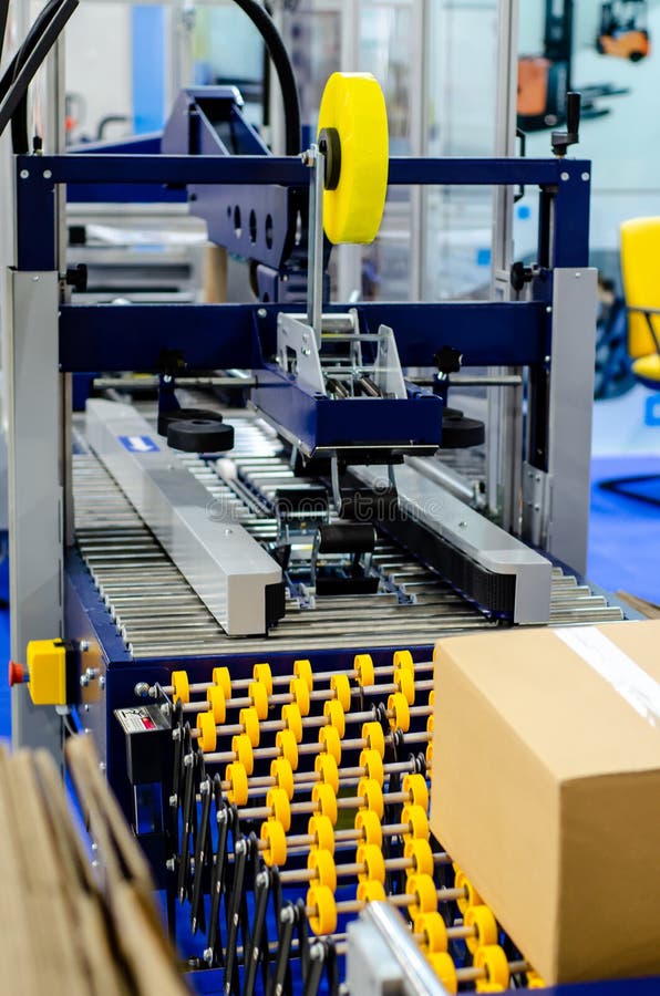 Automatic Tape Carton Sealing Machine,box Folding Machine Stock Photo ...