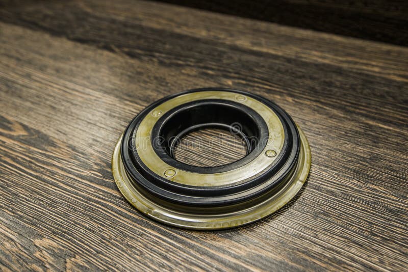 Automatic Transmission Piston on Wooden Background Stock Image - Image ...