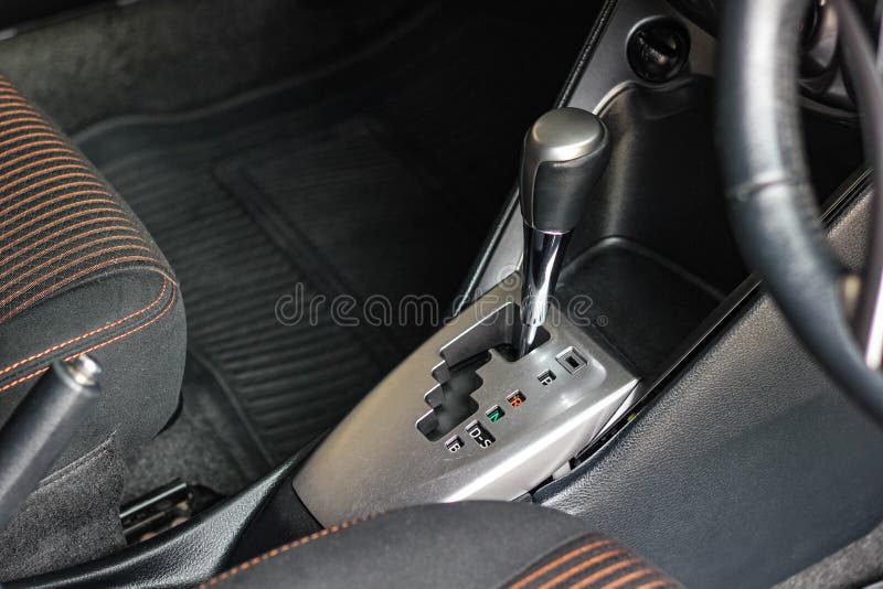 Automatic Transmission Shift Selector in the Car Interior. Closeup a ...