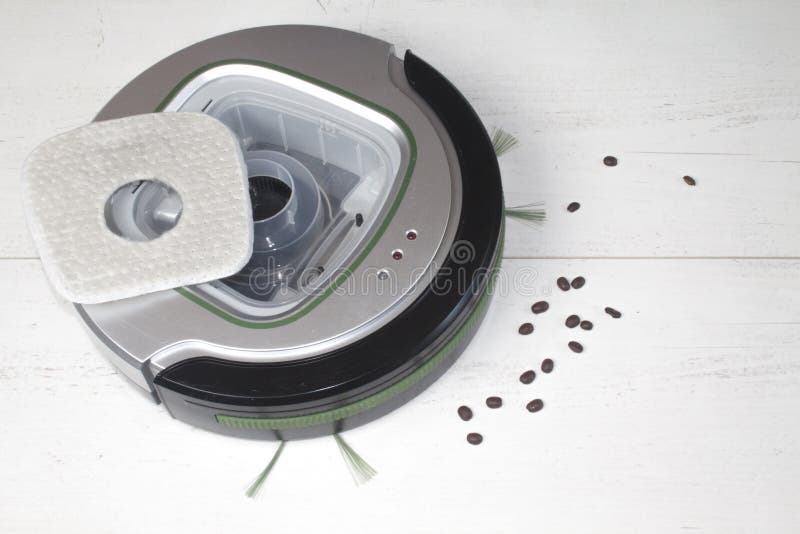 Automatic Vacuum Cleaner on White Floor. Stock Photo - Image of ...