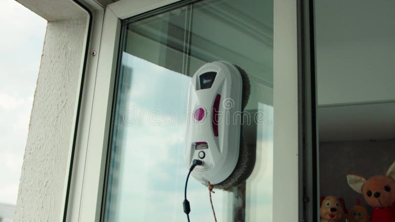 Automatic Vacuum Robot Window Washer Washes Glass from Dirt. Modern ...