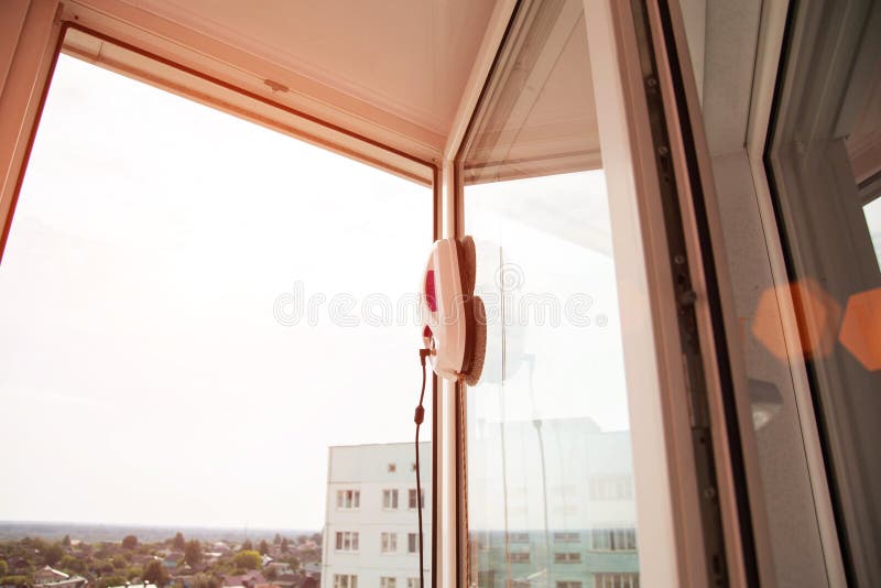 Automatic Vacuum Robot Window Washer Washes Glass from Dirt. Modern ...