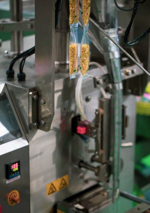 Automatic Vertical Filling and Sealing Machine Stock Photo - Image of ...