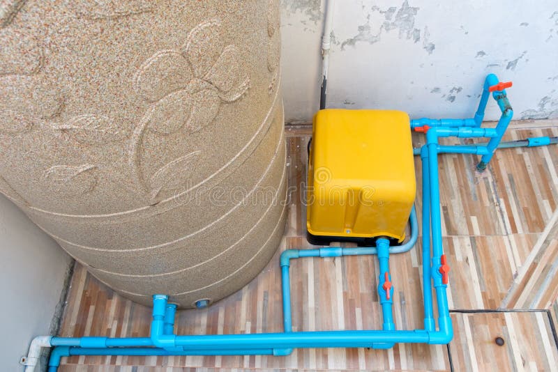 The Automatic Water Pump and the Large Water Tank for the Distribution ...