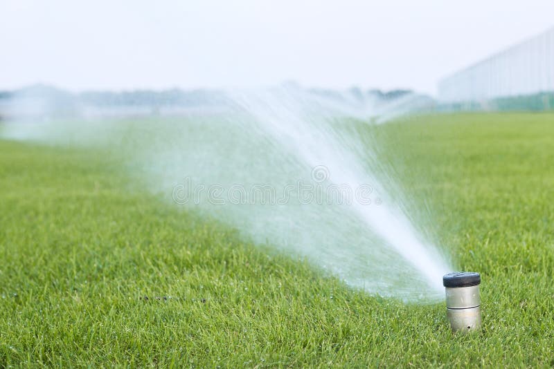 Watering a Football Field with Automatic Control Stock Photo - Image of ...