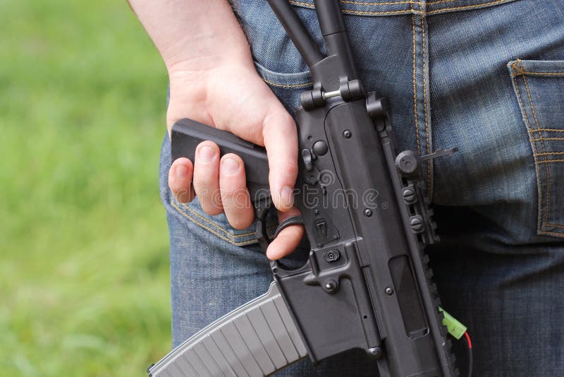 Automatic weapon in hand stock photo. Image of special - 59641546