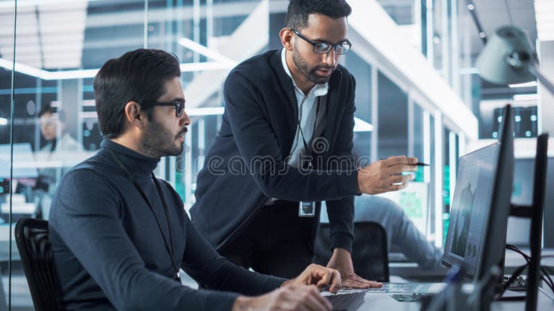 Automation Development Factory: Project Manager and Chief Mechanical Engineer Talk, Point at ...