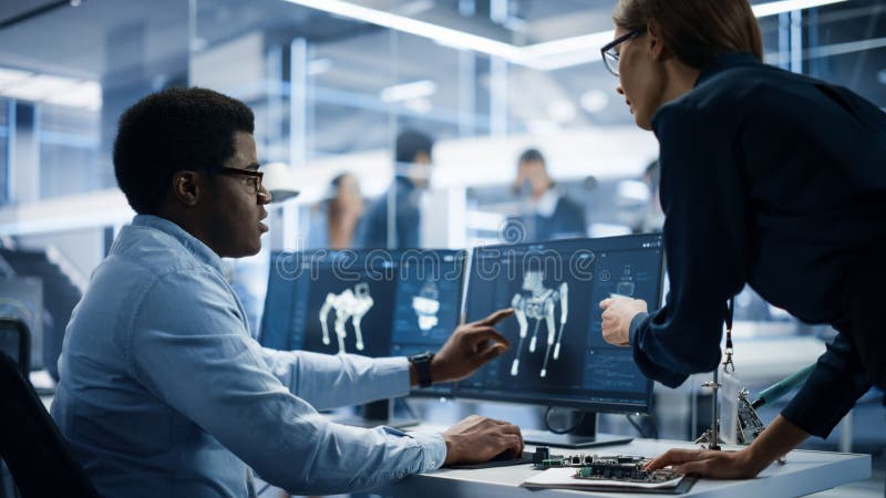 Automation Development Factory: Project Manager and Software Developer Talk, Point at Computer ...