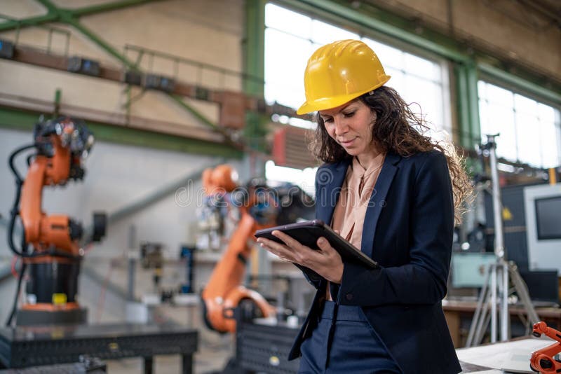 Automation Female Engineer with Tablet for Programming Robotic Arm in ... Automation Female Engineer with Tablet for Programming Robotic Arm in ...