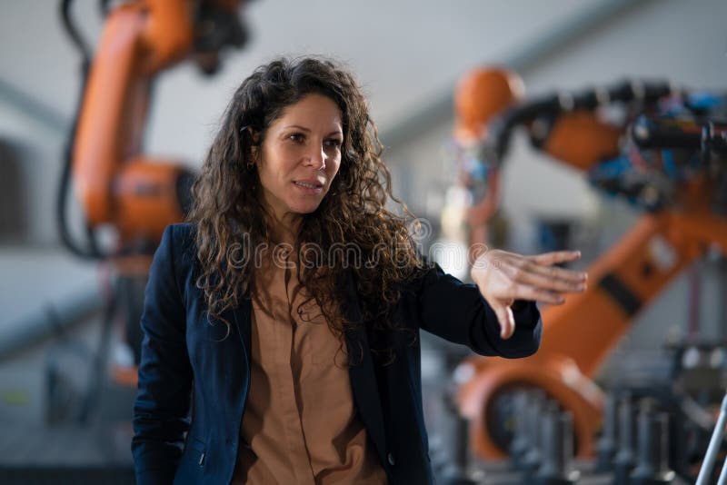 Automation Female Engineer Talking To Somebody about Programming ... Automation Female Engineer Talking To Somebody about Programming ...