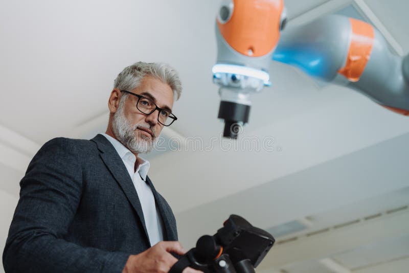 Automation, Robotics Engineer Working on Robotic Knee Replacement ...