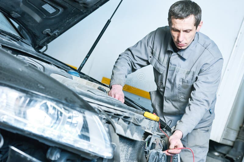 Automobile Car Electrician at Work Stock Image - Image of engine, check ...