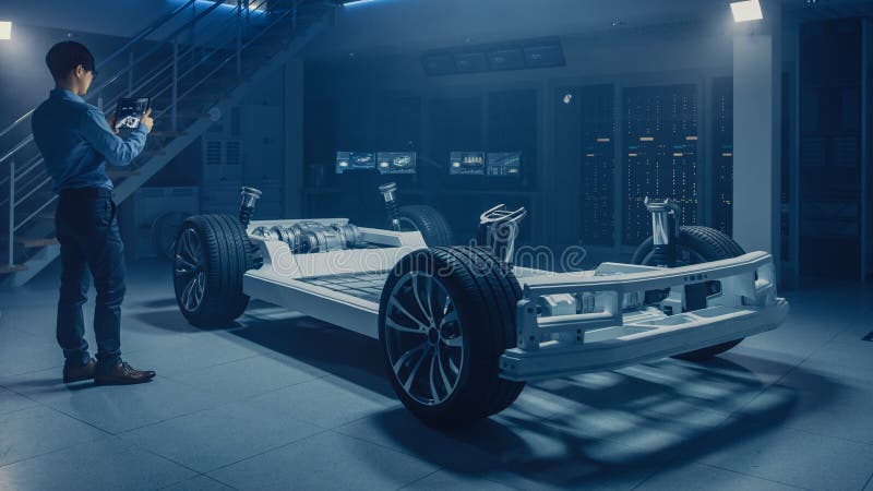 Automobile Engineer Working on Electric Car Chassis Platform, Using ...