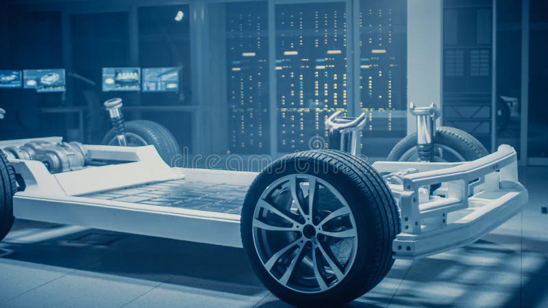 Automobile Engineers Discussing and Designing Electric Car Chassis ...