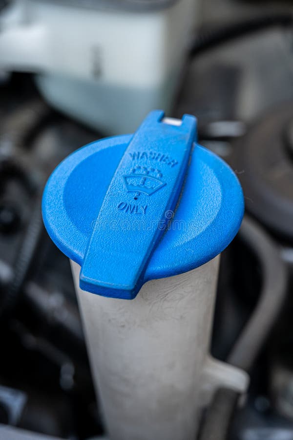 Automobile Maintenance. Windshield Washer Fluid Cap with Blue Color in ...