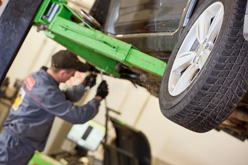 Automobile Service in Garage Workshop. Tyre Replacement Stock Image ...