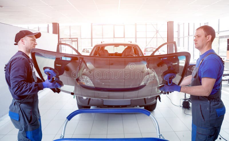 Automobile Special Workers Replacing Windscreen of a Car in Auto ...