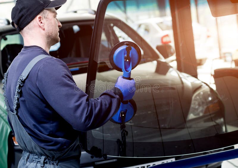 Automobile Special Workers Replacing Windscreen of a Car in Auto ...