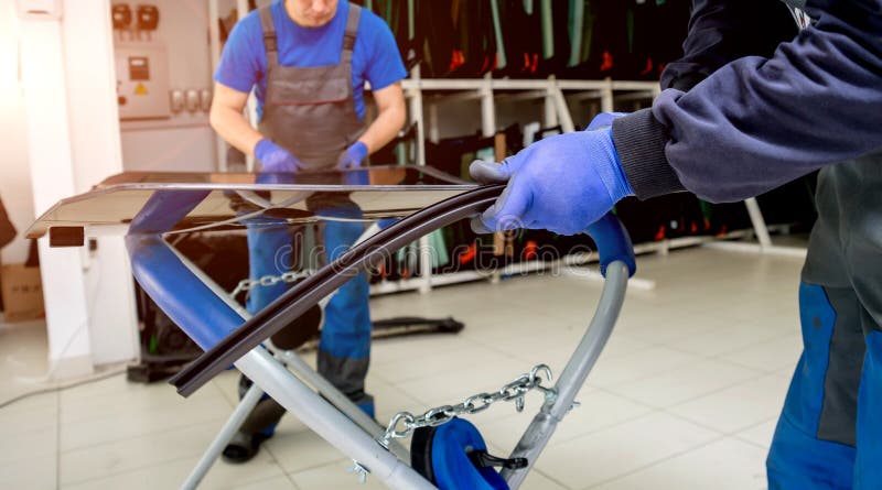 Automobile Special Workers Replacing Windscreen of a Car in Auto ...